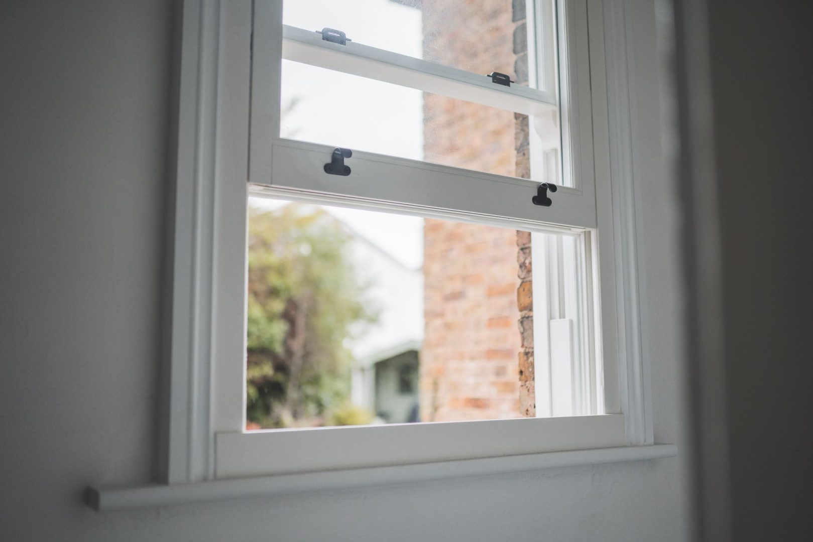 Wood Sash Windows vs Wood Effect uPVC Sash Windows
